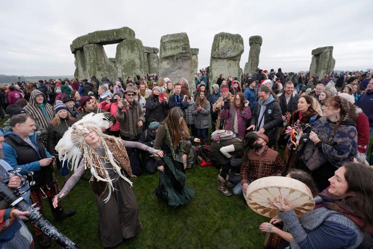 Thousands greet sunrise on winter solstice at Stonehenge