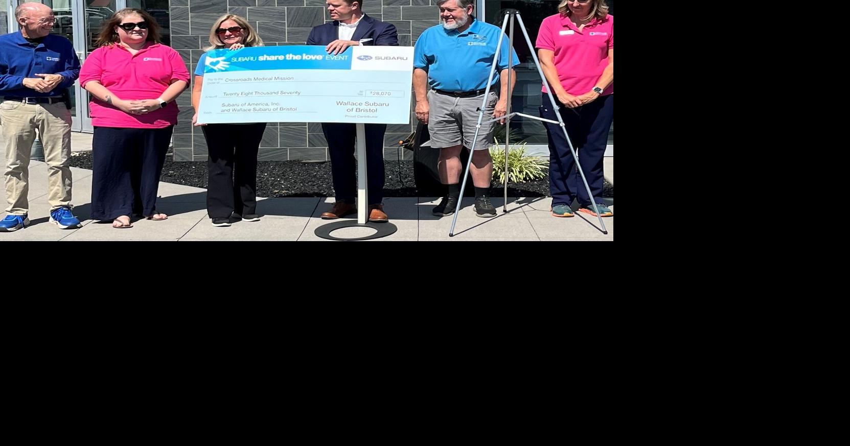 Wallace Subaru of Bristol presents Crossroads Medical Mission check