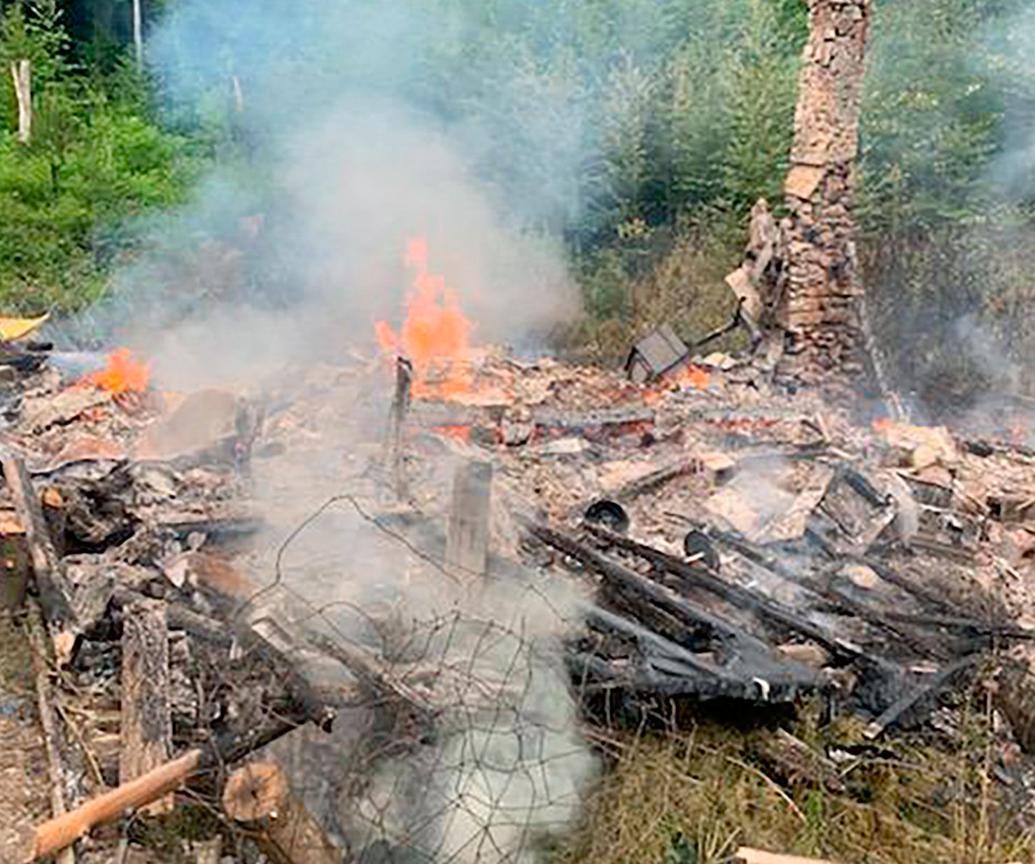 Fire destroys cabin of New Hampshire man forced out of woods