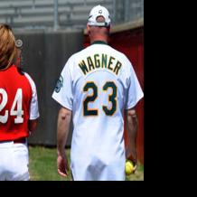 Denny Wagner supports his daughter Haley in softball