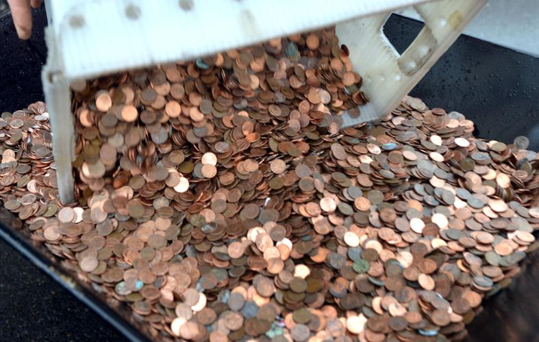Virginia man spends $1,000 to deliver 300,000 pennies to Lebanon DMV