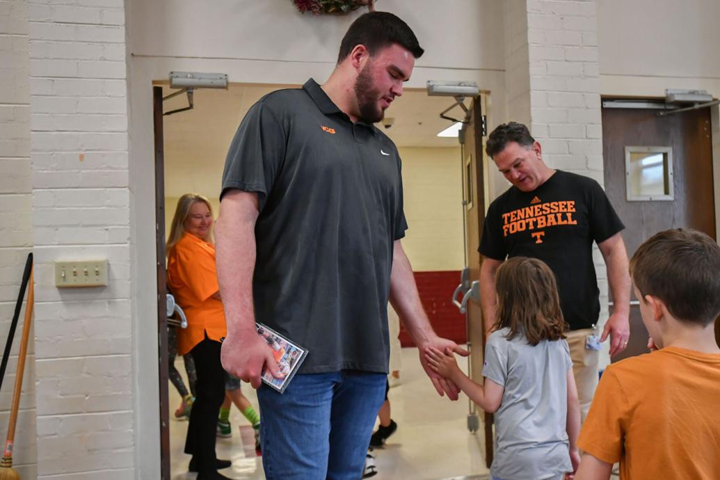 Current and former UT players visit Bluff City Elementary