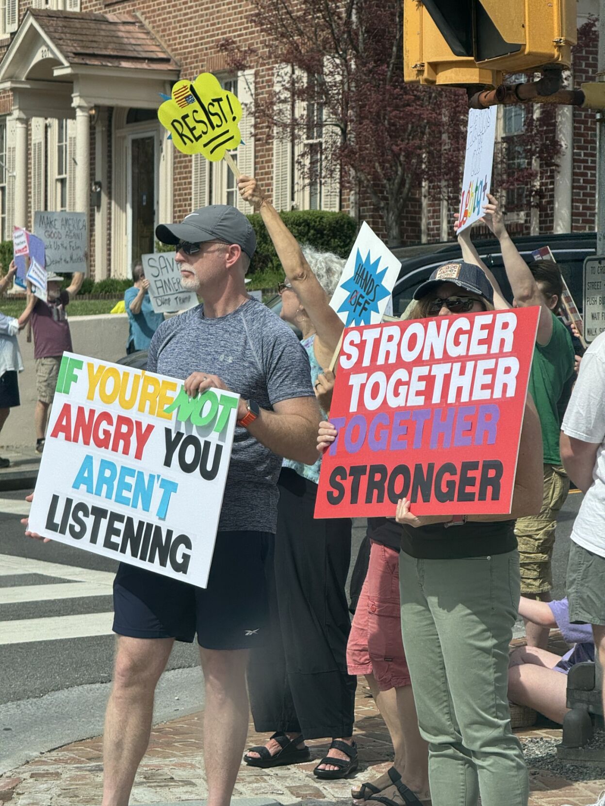 Protesters gather at Abingdon federal courthouse to protest Trump, Musk