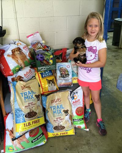 Lyon teen spends her birthdays caring for homeless animals | News ...