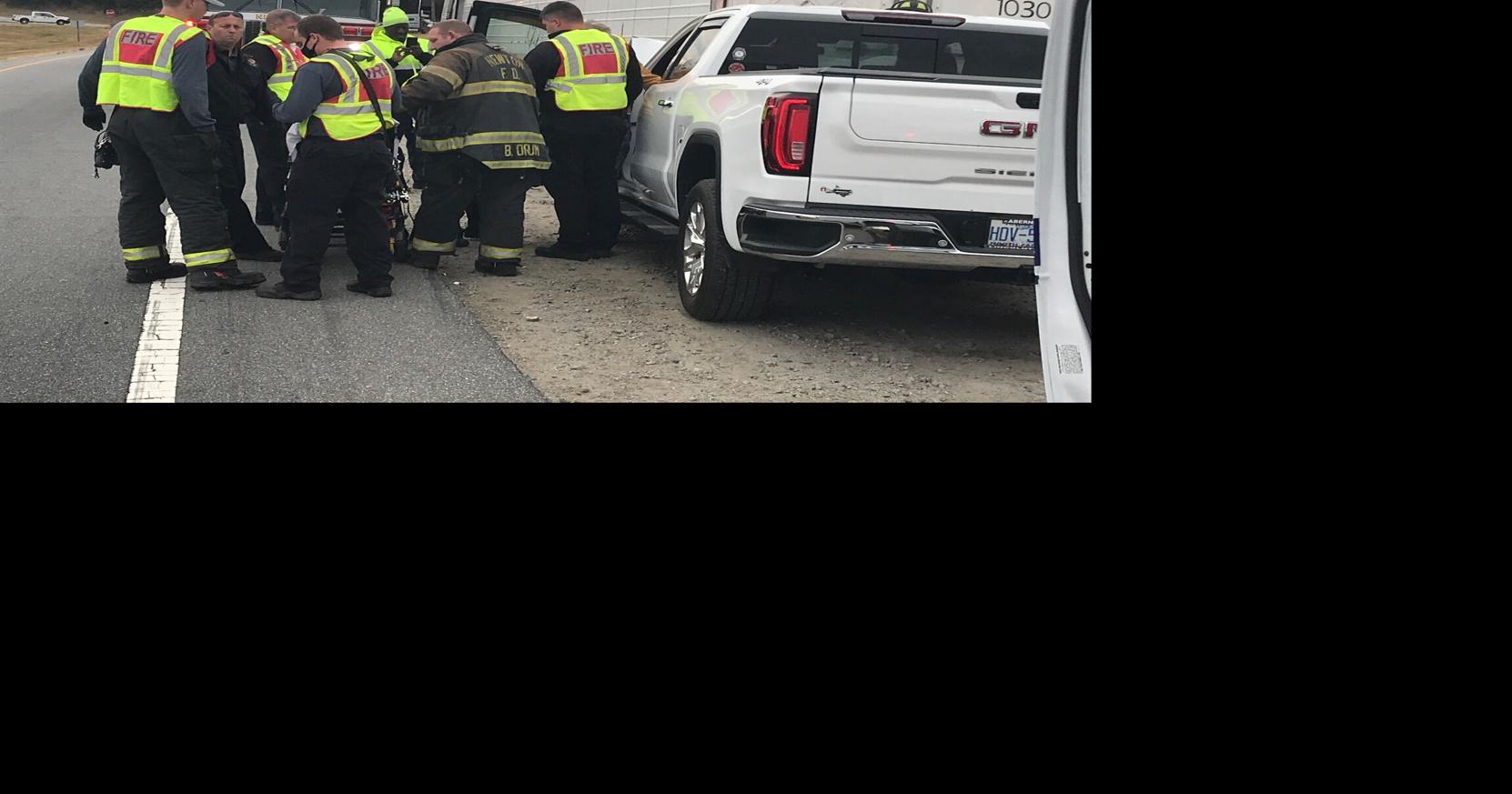 Truck crashes into back of stopped 18-wheeler; 2 injured