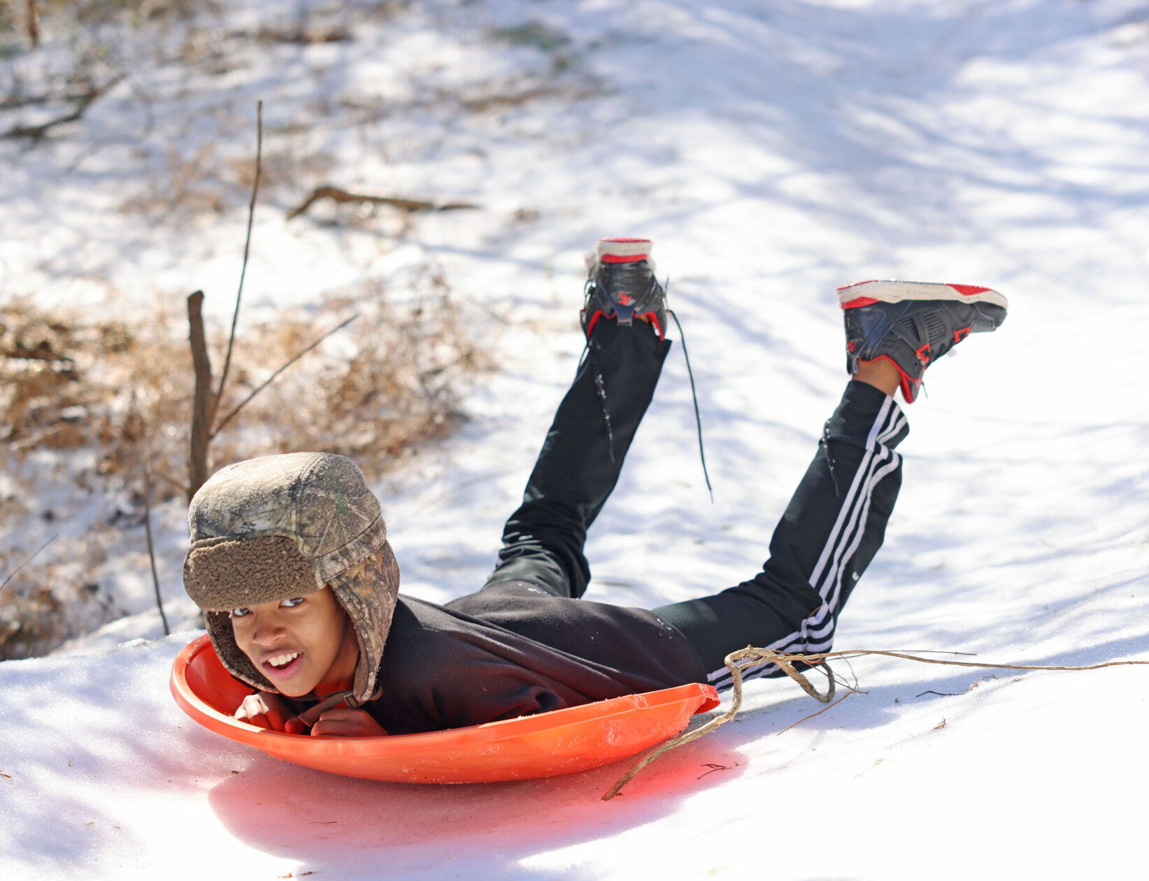 Alexander County NC children sled in leftover snow