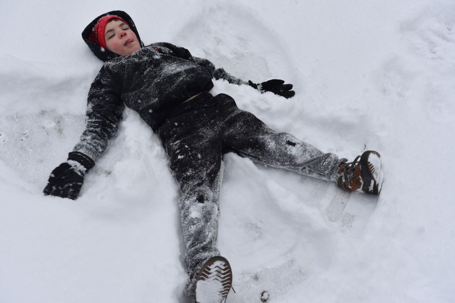 See photos of snow in and around Hickory on Saturday