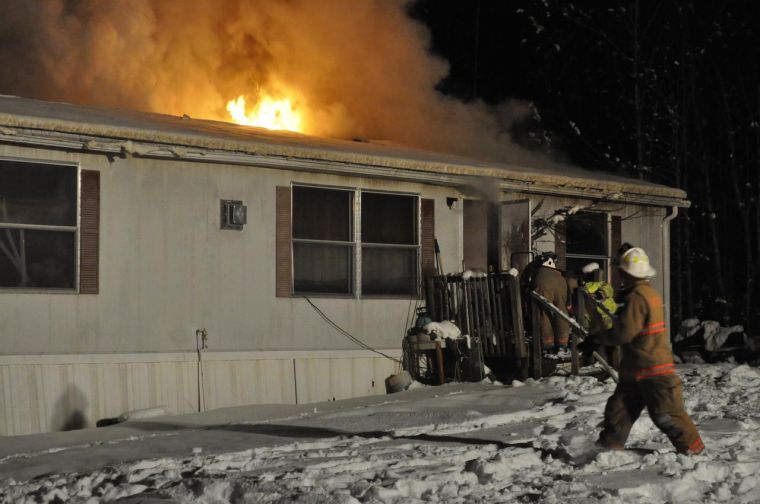 Fire heavily damages mobile home