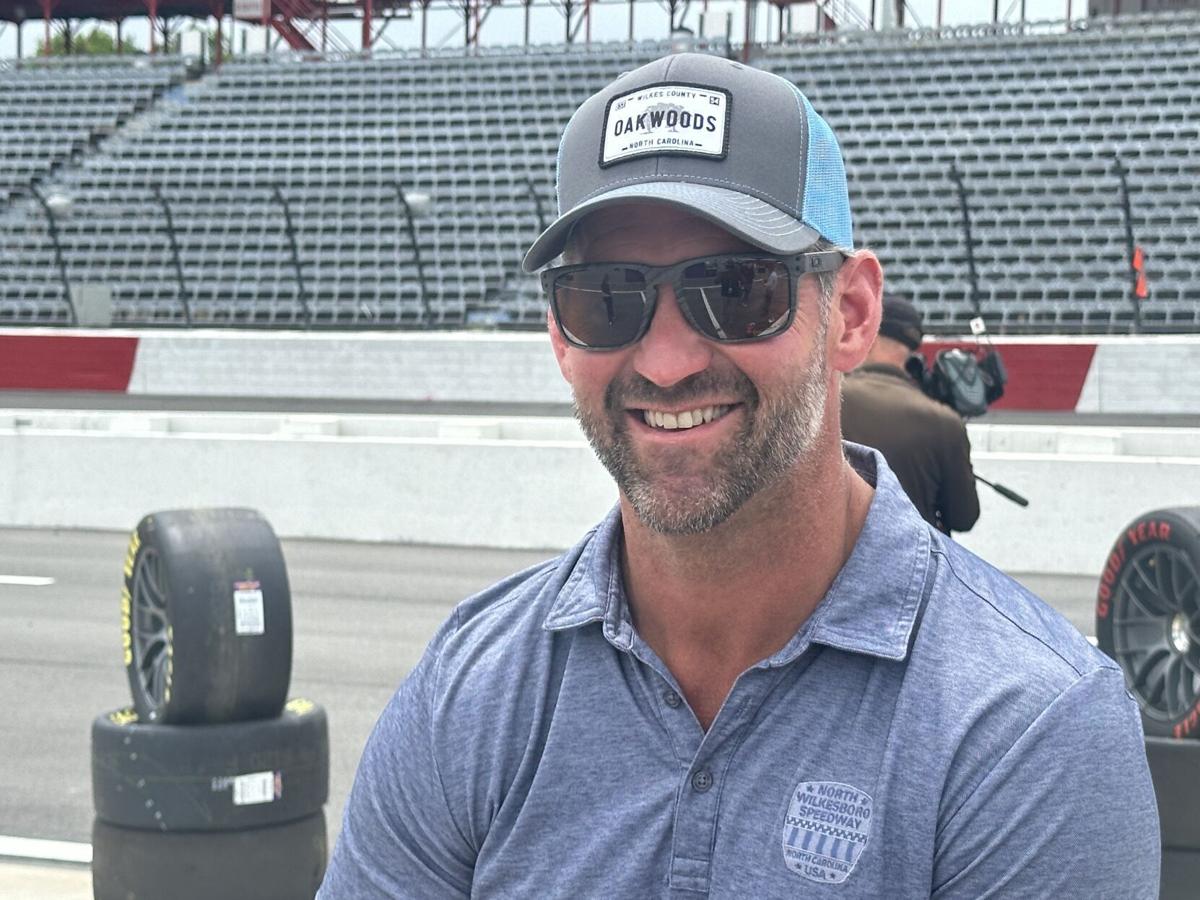 Drivers take media for a drive on the new asphalt at North Wilkesboro ...