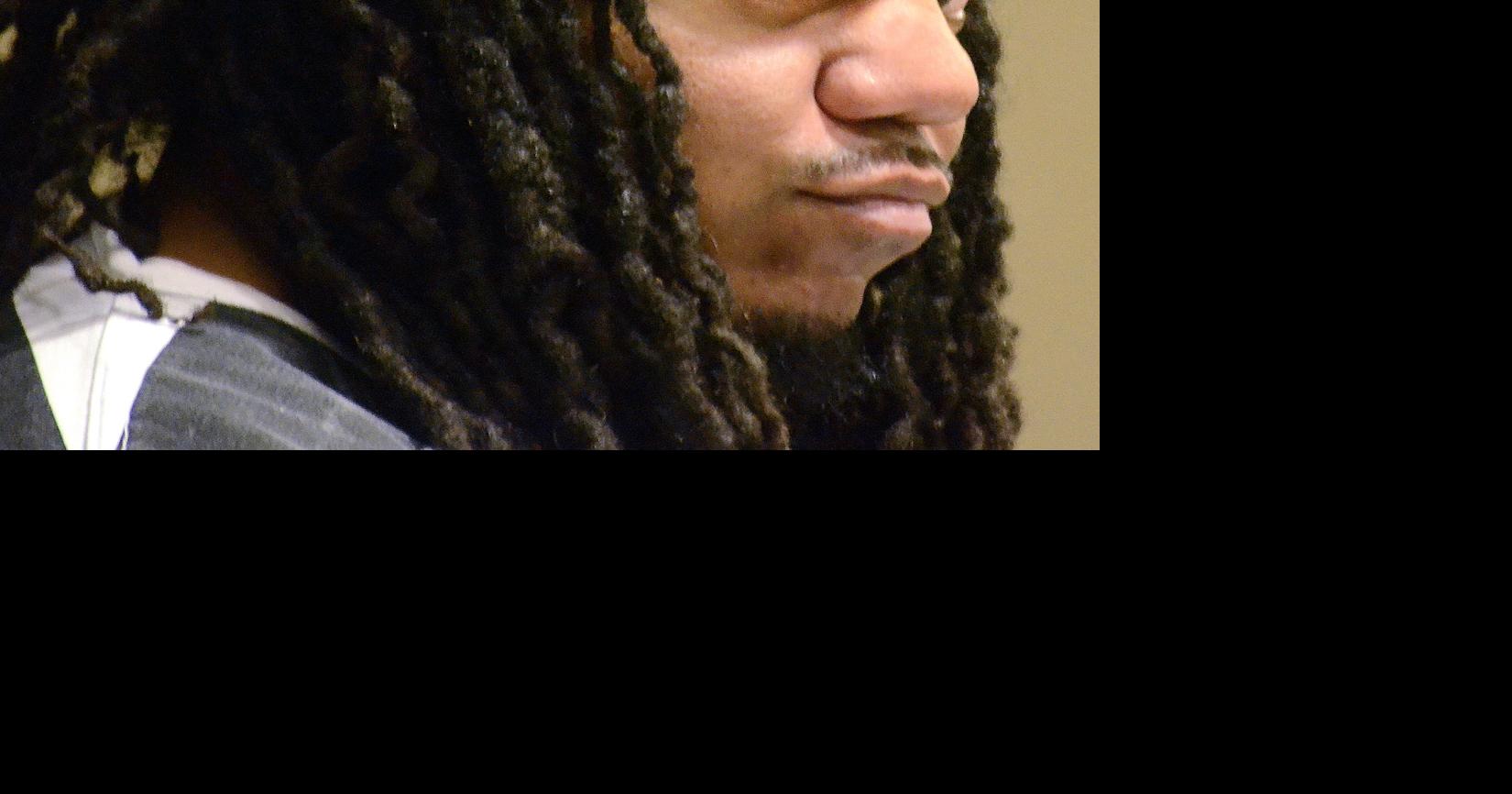 Odom makes third appearance in murder trial, refuses to take seat