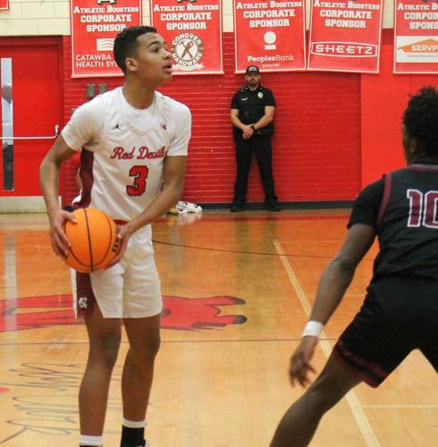 Newton-Conover boys basketball battles back from adversity