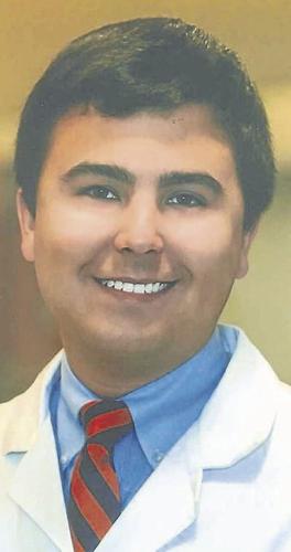 Urologist celebrates completion of training