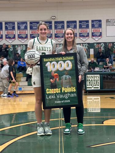 Bandys senior hits milestone, Maiden girls top East Lincoln