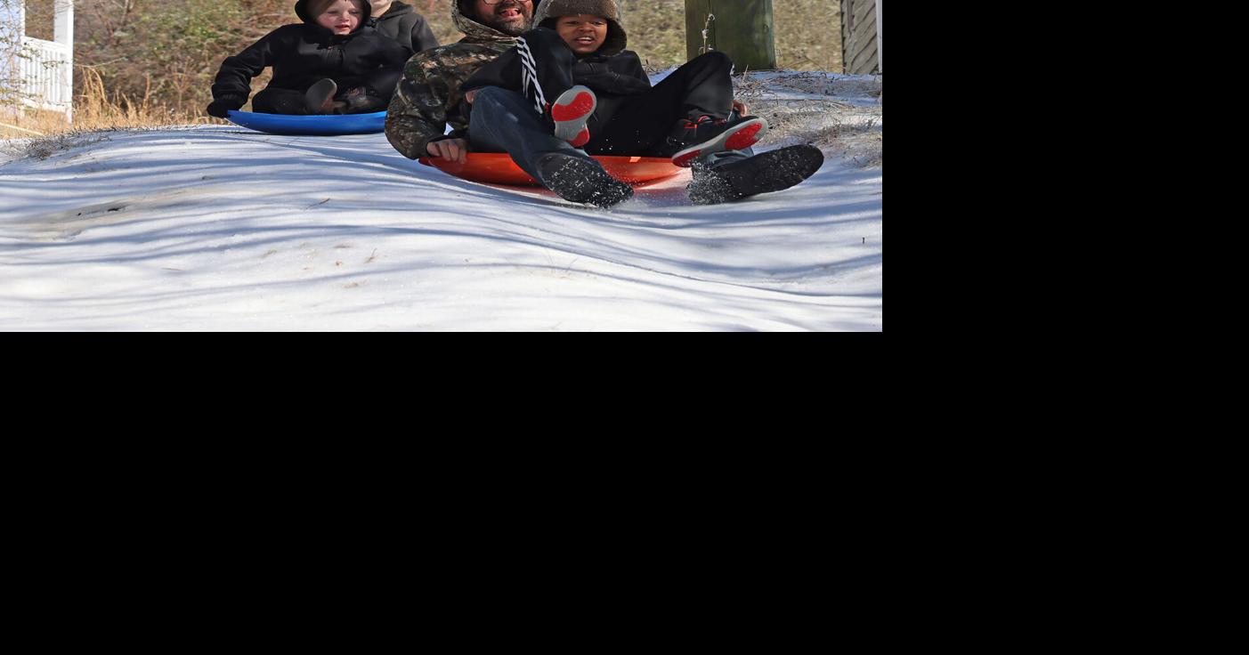 Alexander County NC children sled in leftover snow