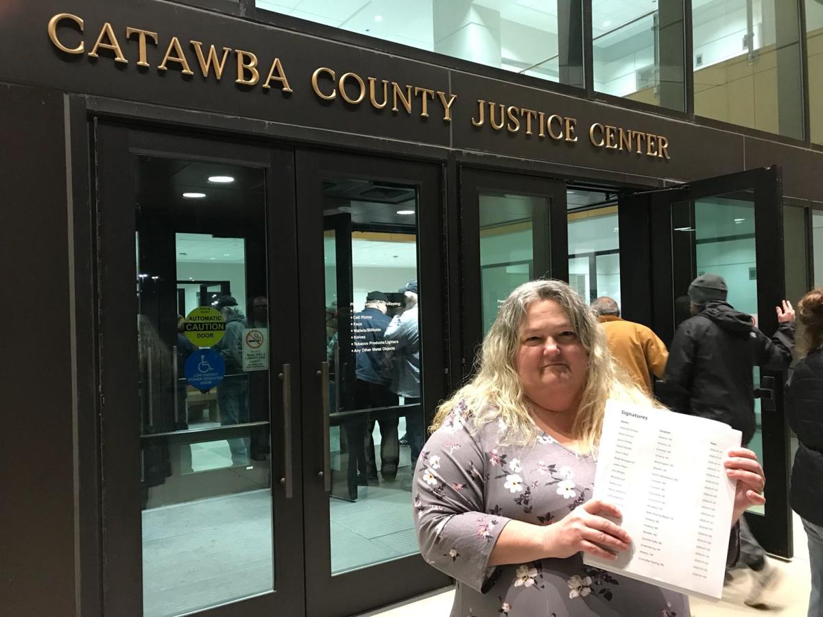 Capacity crowd urges commissioners to protect second amendment