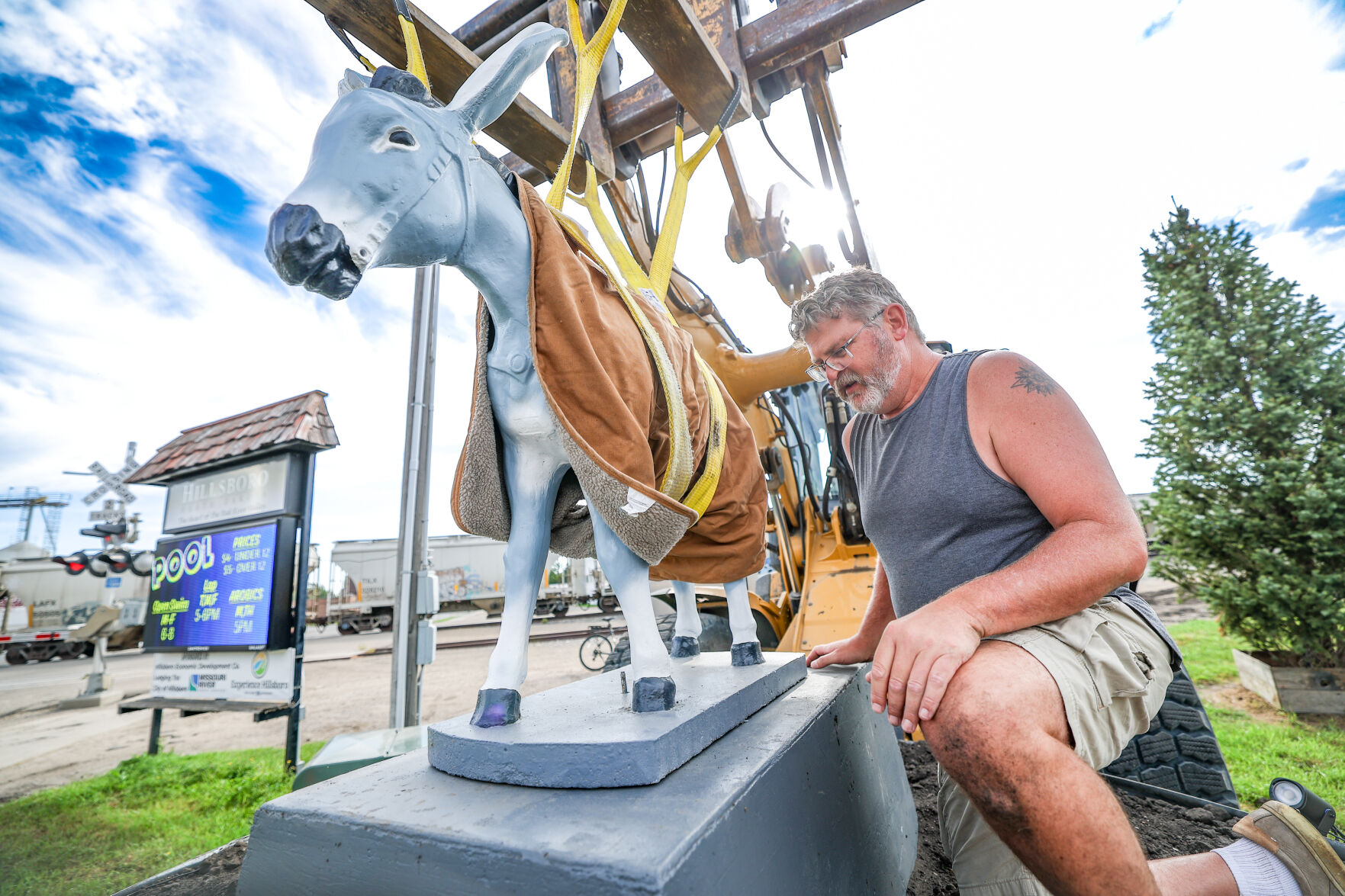 Iconic burro statue makes its return to Railroad Park after long ...