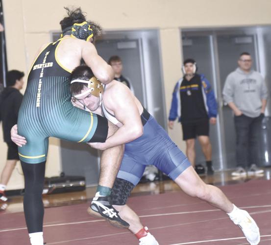 Lake Mills' Owen Burling wins 170 weight class at regionals, leads 4 L ...