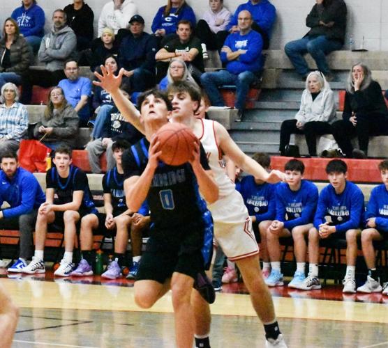 Matt Buckman sets new school record as Cambridge boys basketball grabs ...