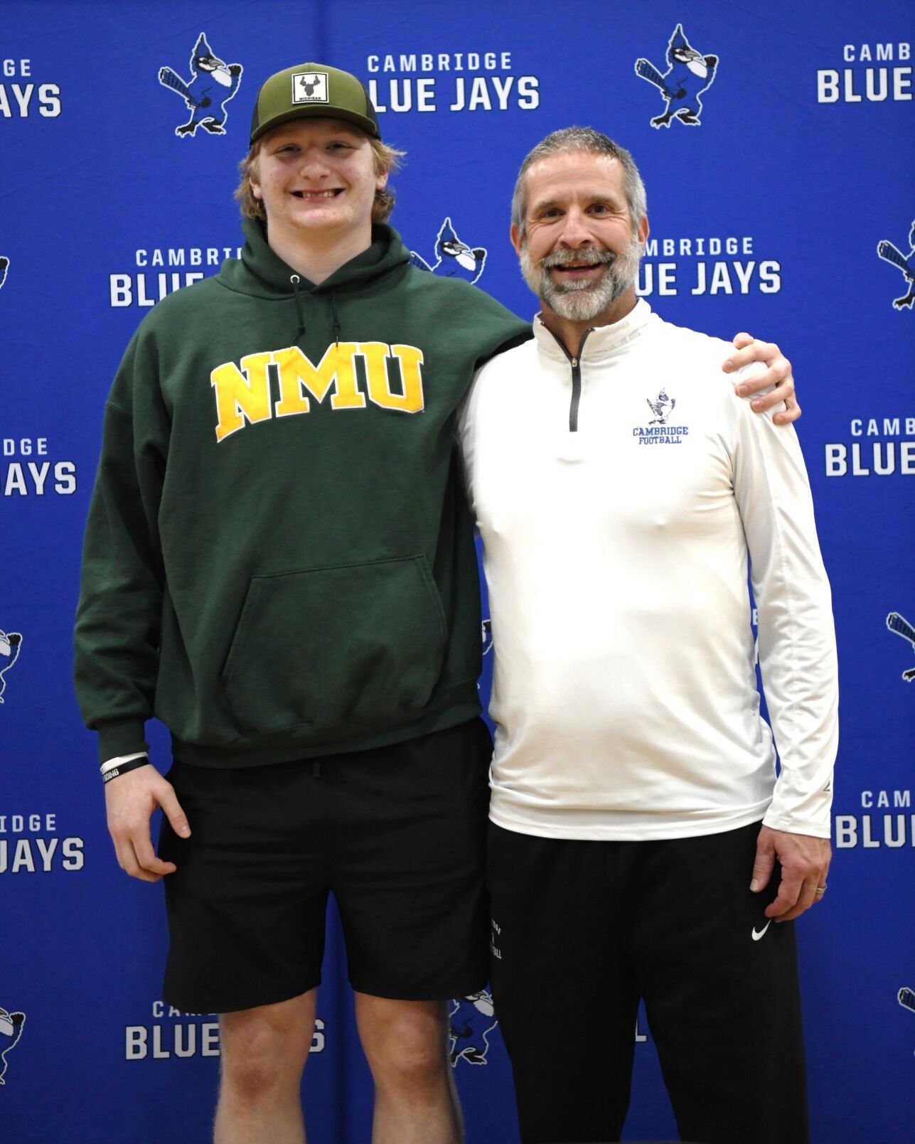 Cambridge's Incha signs to play football at Northern Michigan ...