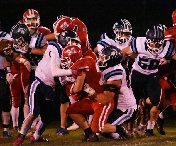 McFarland football battles hard against Monroe, eliminated in playoff ...