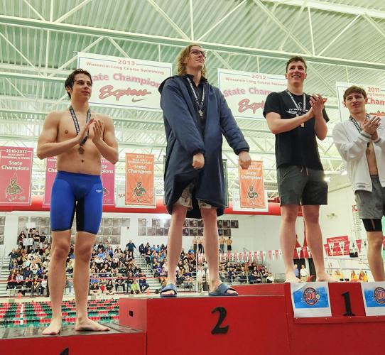 McFarland boys swim breaks two state records, wins seven state titles ...