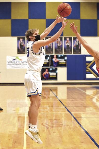 WIAA Division 2 boys basketball: Charlie Bender's 21-point performance ...