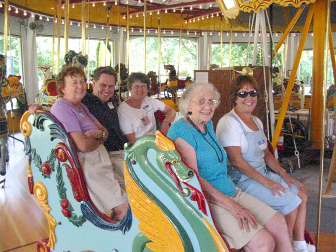 Woman shares birth year with historic carousel | Local | hngnews.com