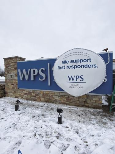 WPS installs face masks on W. Broadway sign | Monona / Cottage Grove ...