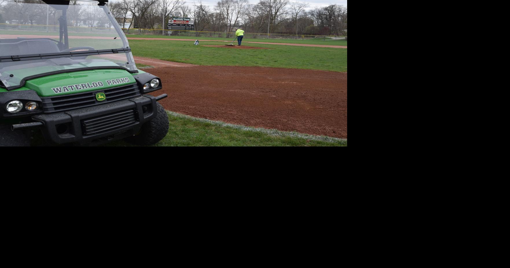 Preparing Waterloo’s Skalitzky Field for the night’s ball game ...