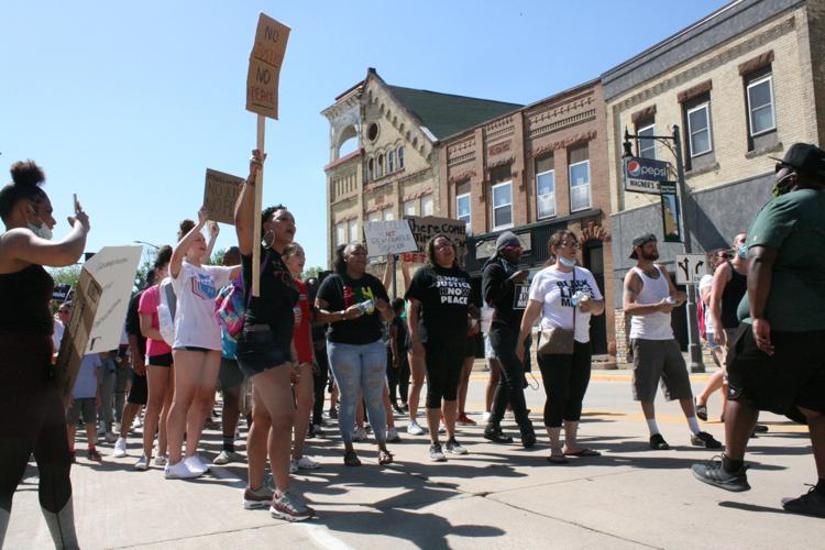 Hundreds march on Sun Prairie City Hall to protest George Floyd killing ...