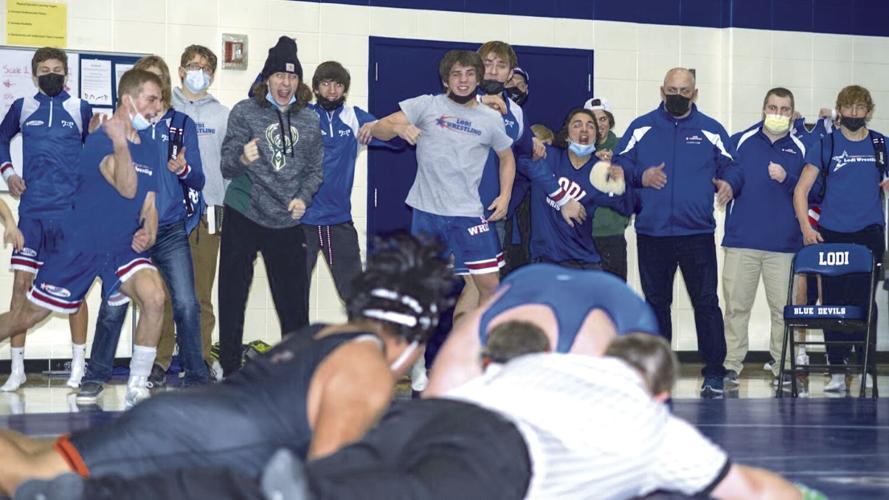 Lodi wrestlers win regional title at home, as seven Blue Devils take ...