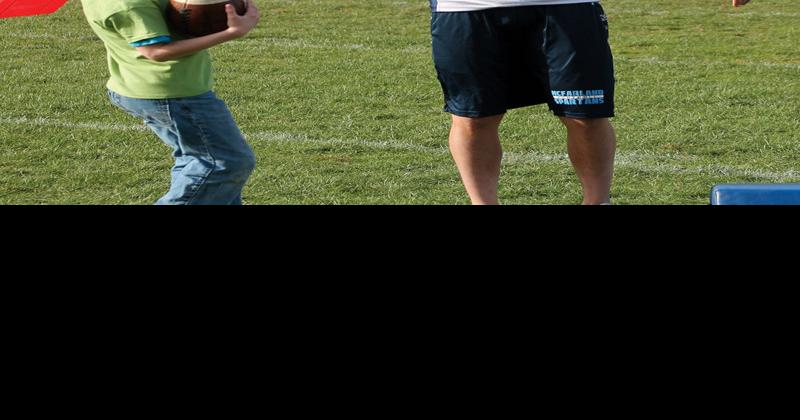 Autistic individuals learn football skills from local players | Local ...