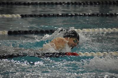 Caleb Jondle wins the 100-yard freestyle, Monona Grove boys swim ...