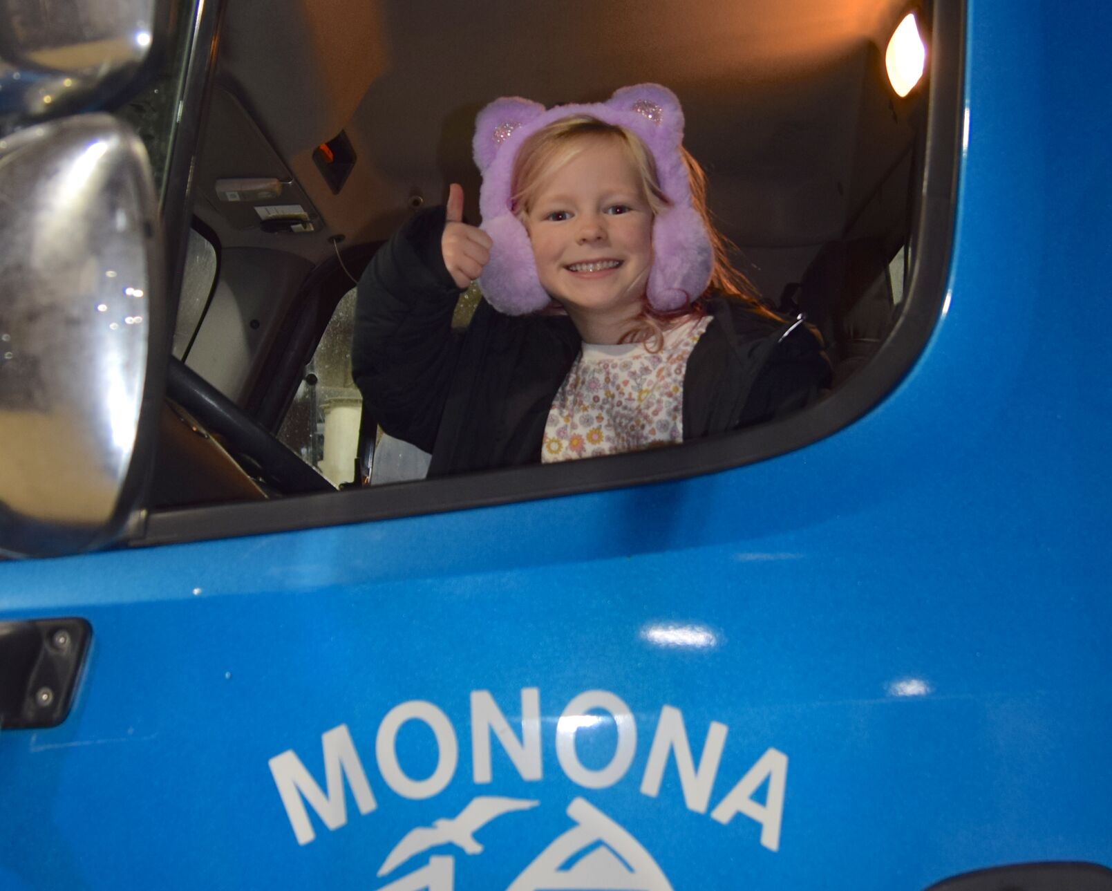 Girl gets ride in Monona leaf truck after winning coloring contest ...