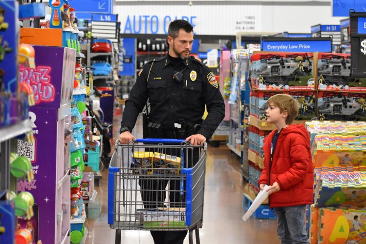 ‘Shop With a Cop’ helps Milton kids buys presents for family | Local ...