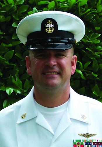 With The Colors - Chief Michael Carlson | Community | hngnews.com