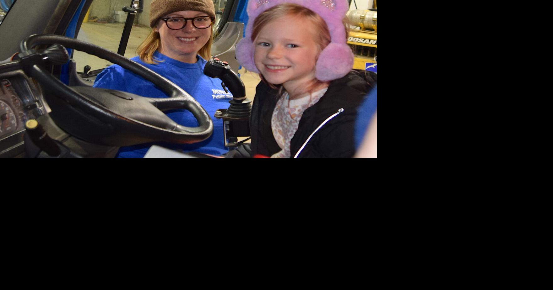 Girl gets ride in Monona leaf truck after winning coloring contest ...