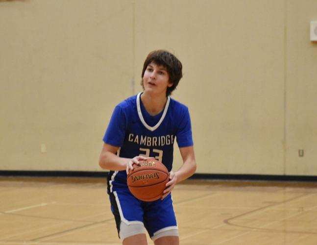 Matt Buckman scores 23, Devin Schuchart adds 15, Cambridge boys ...