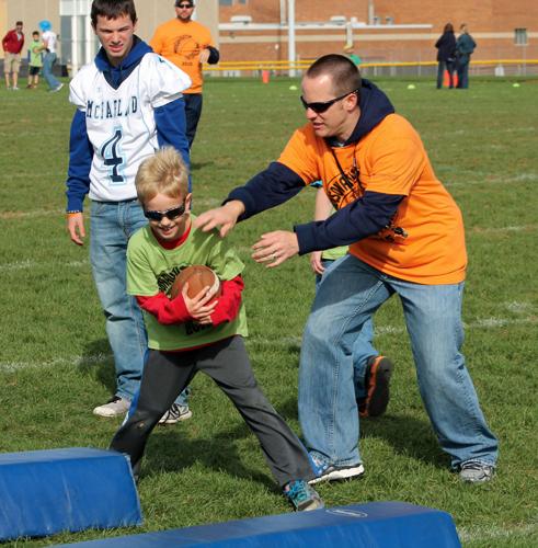Autistic individuals learn football skills from local players | Local ...