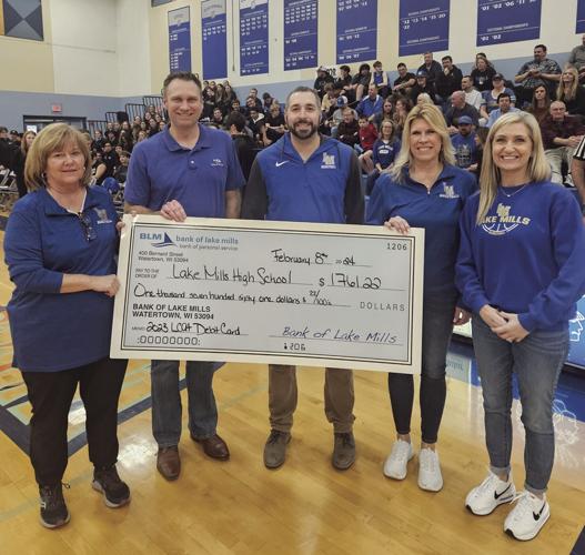 Bank of Lake Mills presents checks from purchases made with mascot ...