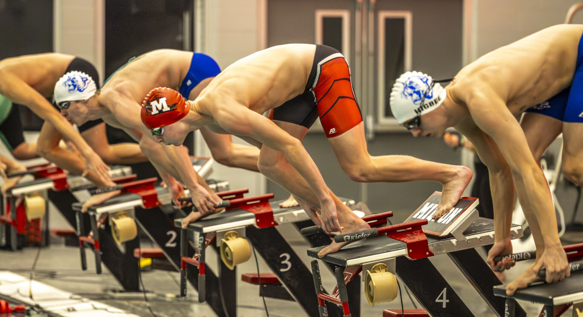 Boys' High School Swimming: Cougars make it four in a row at Rock ...