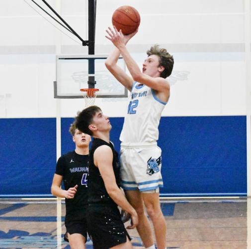 Warriors hold off Monona Grove boys basketball in clash of top Badger ...