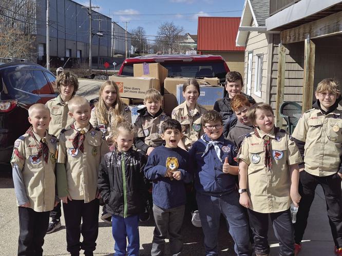 Local scouts collect food for fundraiser | Community | hngnews.com