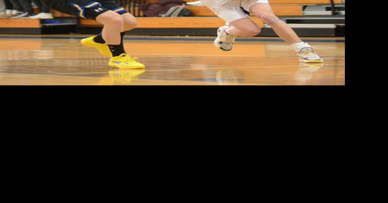 Boys basketball: Lake Mills downs Lodi to clinch share of Capitol North ...