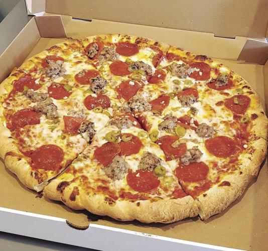 Satisfy your pizza urge at Famous Yeti’s | Monona / Cottage Grove ...