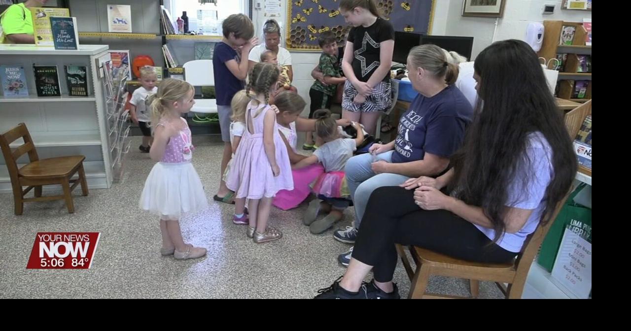 Volunteers from Deb's Dogs chat with kids at Cairo library about animal ...