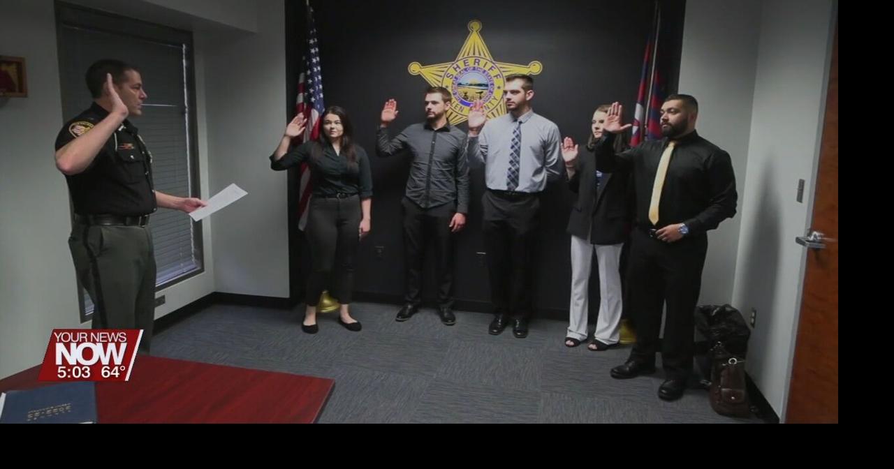 Five officers are sworn in as the first class of the new cadet program ...