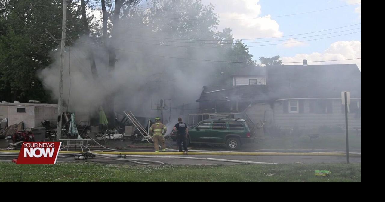 Crews battle two-alarm fire at the corner of W. Fifth and McClain in ...