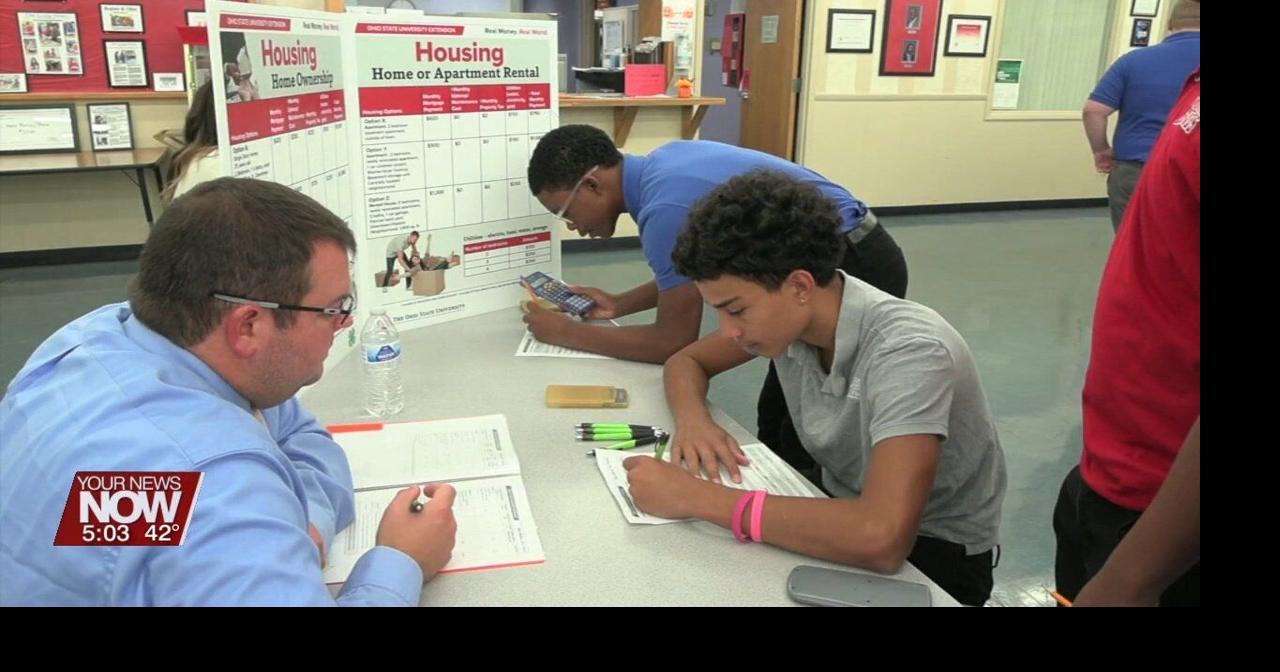Heir Force Academy students learn about money management with Real ...