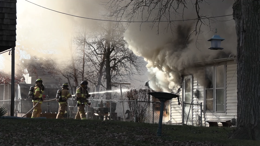 House fire on E. Elm causes extensive damage and injures a firefighter ...